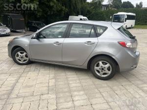 Pelēks Mazda 3 2013 Rīga, ar dzinēja tilpumu 1.60 L un nobraukumu 317 tūkst. km par 2300 €, foto 10 vietnē AUTOMOTO.COM.LV