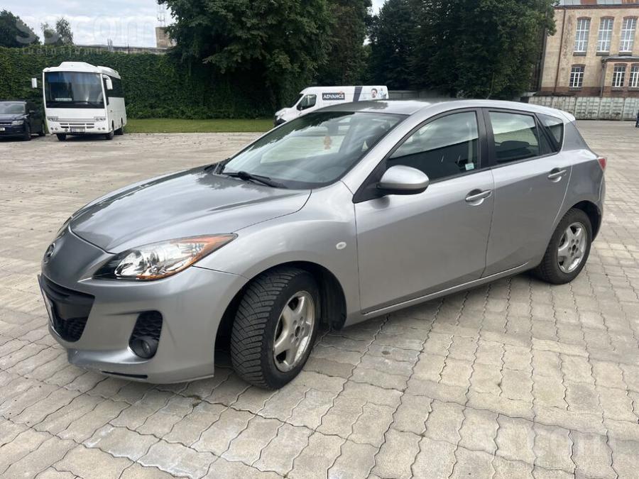 Pelēks Mazda 3 2013 Rīga, ar dzinēja tilpumu 1.60 L un nobraukumu 317 tūkst. km par 2300 €, foto 11 vietnē AUTOMOTO.COM.LV