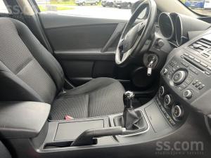 Pelēks Mazda 3 2013 Rīga, ar dzinēja tilpumu 1.60 L un nobraukumu 317 tūkst. km par 2300 €, foto 14 vietnē AUTOMOTO.COM.LV