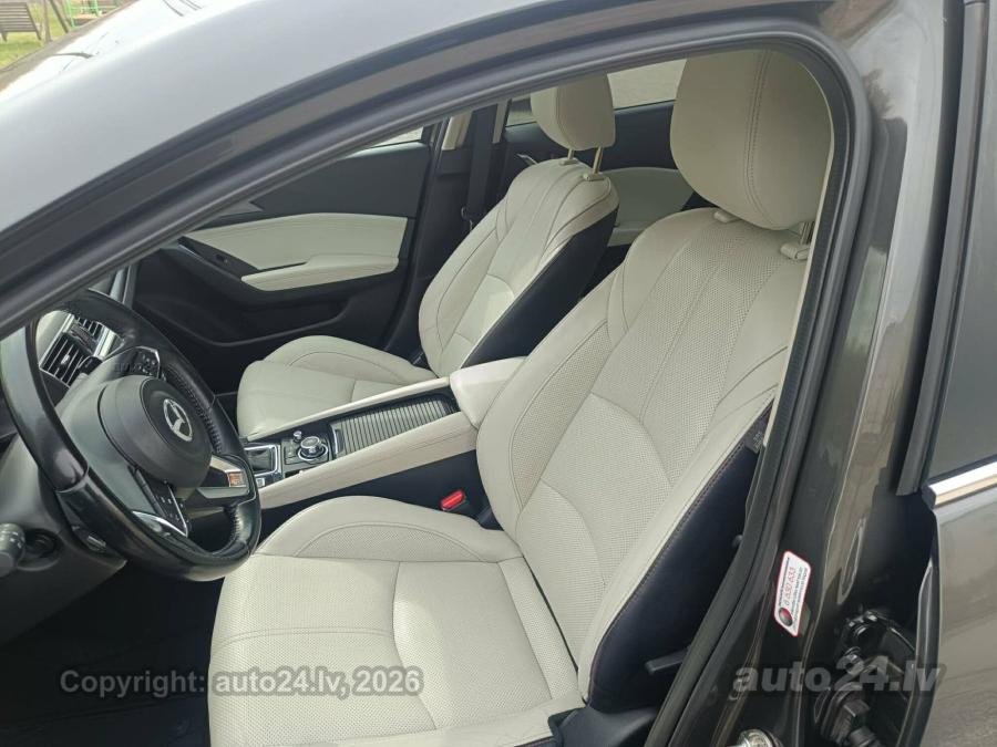 Grey Mazda 3 2017 in Tallinn, with an engine capacity of 2.00 L and mileage of 76 thousand km for 11990 €, photo 8 on AUTOMOTO.COM.LV