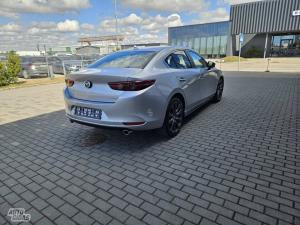 Grey Mazda 3 2020 in Siauliai, with an engine capacity of 2.50 L and mileage of 63 thousand km for 16888 €, photo 6 on AUTOMOTO.COM.LV
