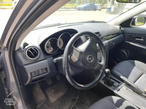 Mazda 3 2007 in Vilnius, with an engine capacity of 1.60 L and mileage of 261 thousand km for 400 €, photo 7 on AUTOMOTO.COM.LV