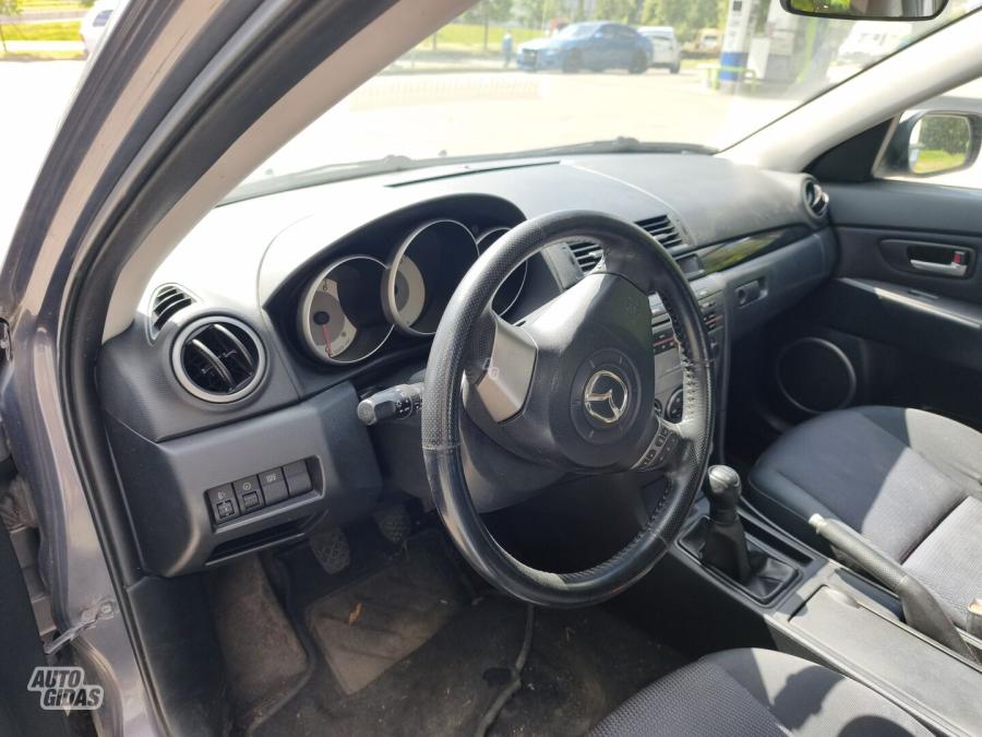 Mazda 3 2007 in Vilnius, with an engine capacity of 1.60 L and mileage of 261 thousand km for 400 €, photo 8 on AUTOMOTO.COM.LV