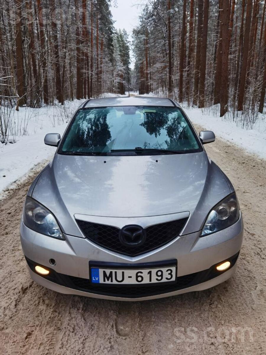 Mazda 3 2007 in Riga, with an engine capacity of 2.00 L and mileage of 258 thousand km for 1000 €, photo 7 on AUTOMOTO.COM.LV