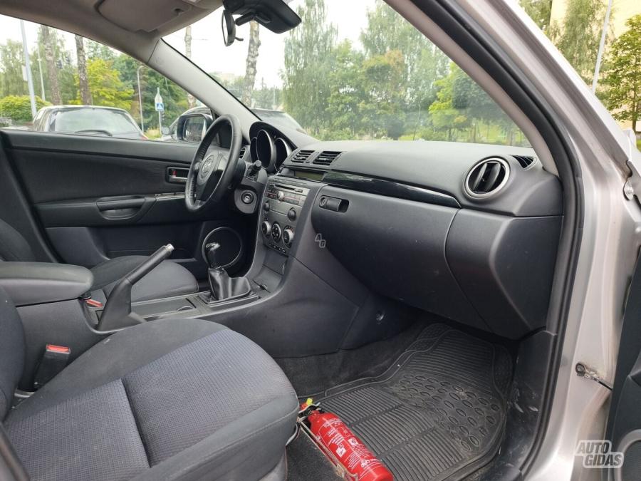 Mazda 3 2007 in Vilnius, with an engine capacity of 1.60 L and mileage of 280 thousand km for 1100 €, photo 14 on AUTOMOTO.COM.LV