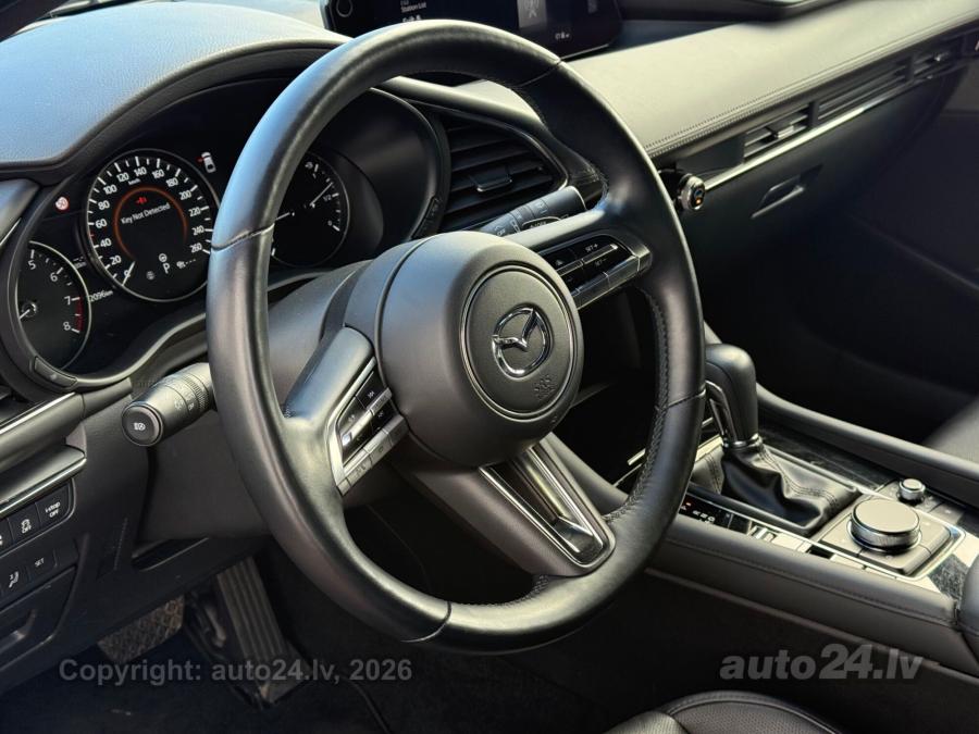 Mazda 3 2020 in Riga, with an engine capacity of 2.00 L and mileage of 52 thousand km for 20500 €, photo 14 on AUTOMOTO.COM.LV