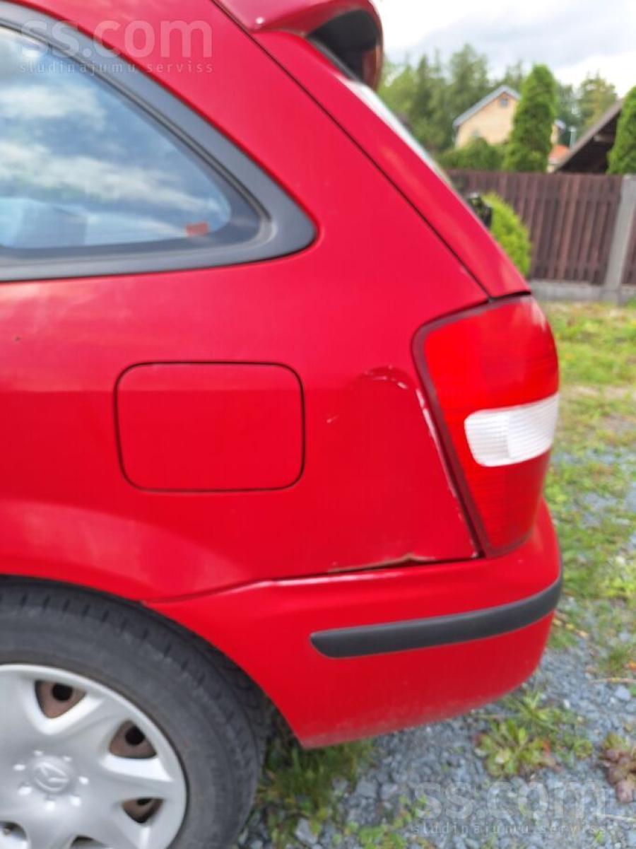 Sarkans Mazda 3 1999 Rīga, ar dzinēja tilpumu 1.50 L un nobraukumu 103 tūkst. km par 800 €, foto 4 vietnē AUTOMOTO.COM.LV
