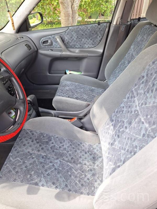 Sarkans Mazda 3 1999 Rīga, ar dzinēja tilpumu 1.50 L un nobraukumu 103 tūkst. km par 800 €, foto 5 vietnē AUTOMOTO.COM.LV