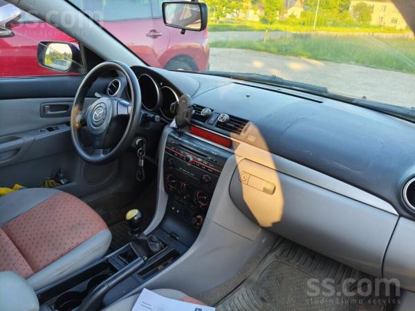 Red Mazda 3 2005 in Ludza, with an engine capacity of 1.60 L and mileage of 232 thousand km for 650 €, photo 5 on AUTOMOTO.COM.LV