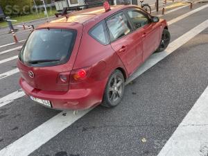 Red Mazda 3 2005 in Riga, with an engine capacity of 1.60 L and mileage of 148 thousand km for 801 €, photo 3 on AUTOMOTO.COM.LV