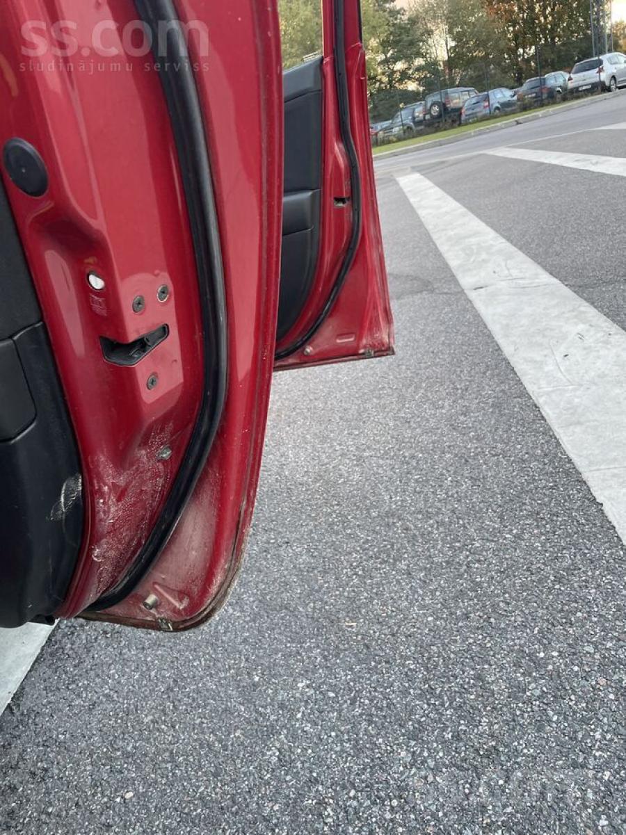Red Mazda 3 2005 in Riga, with an engine capacity of 1.60 L and mileage of 148 thousand km for 801 €, photo 5 on AUTOMOTO.COM.LV