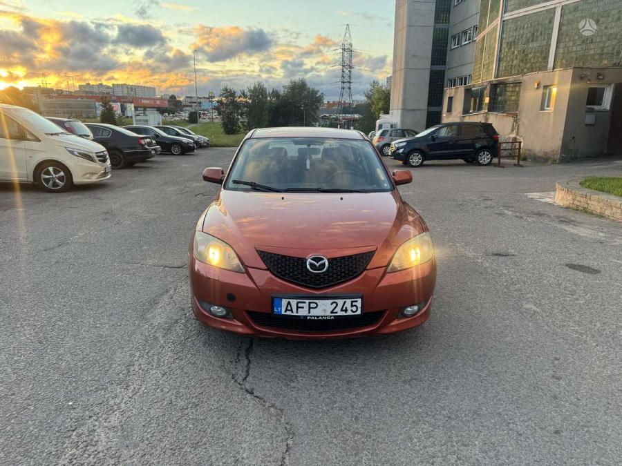 Red Mazda 3 2005 in Vilnius, with an engine capacity of 1.60 L and mileage of 198 thousand km for 1650 €, photo 4 on AUTOMOTO.COM.LV