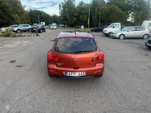 Red Mazda 3 2005 in Vilnius, with an engine capacity of 1.60 L and mileage of 198 thousand km for 1650 €, photo 7 on AUTOMOTO.COM.LV