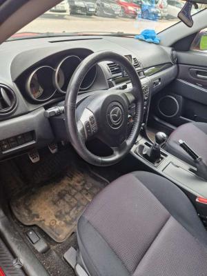 Sarkans Mazda 3 2007 Kauņa, ar dzinēja tilpumu 2.00 L un nobraukumu 274 tūkst. km par 1000 €, foto 15 vietnē AUTOMOTO.COM.LV