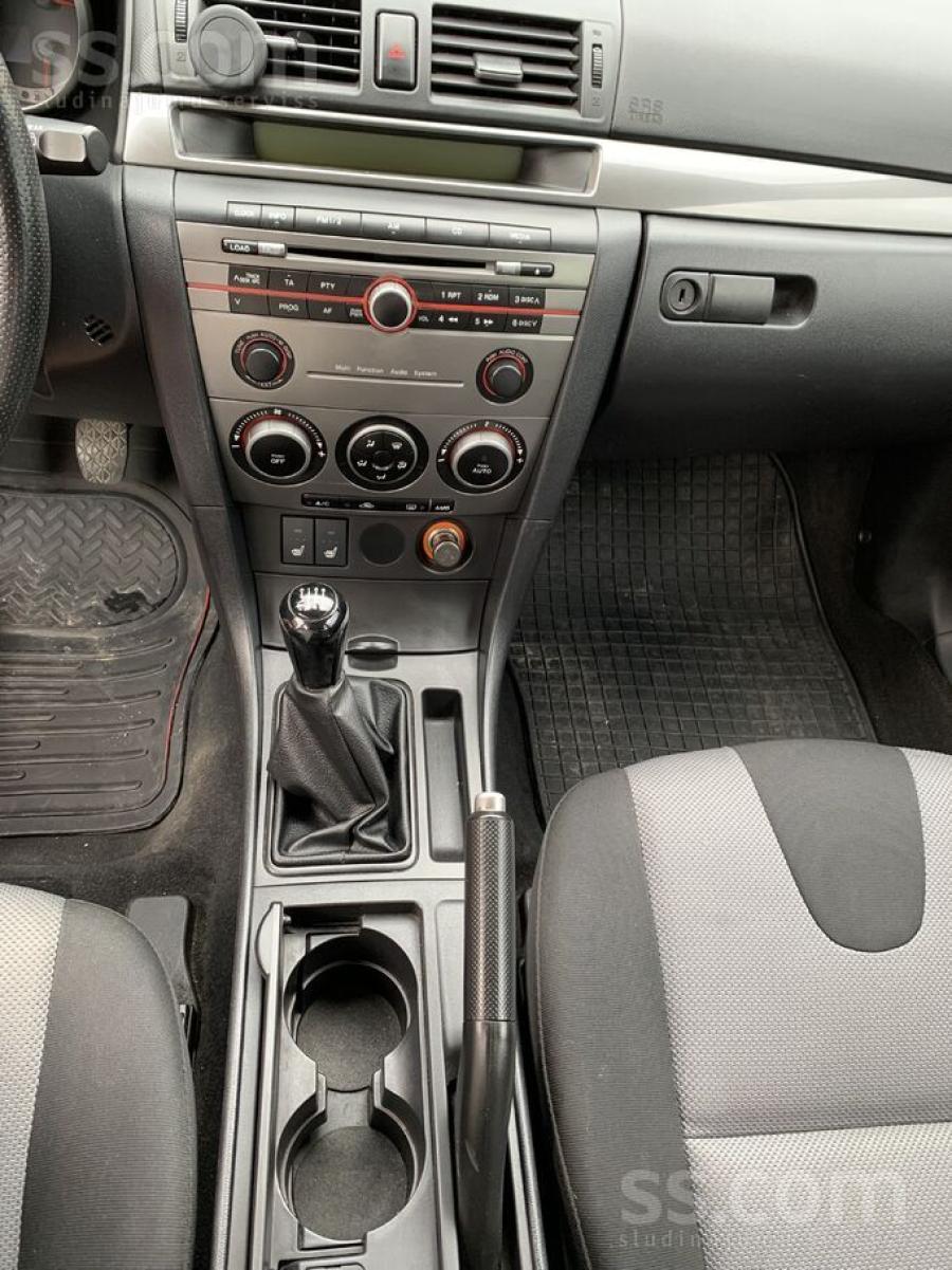 Red Mazda 3 2007 in Rezekne, with an engine capacity of 2.00 L and mileage of 157 thousand km for 1290 €, photo 13 on AUTOMOTO.COM.LV