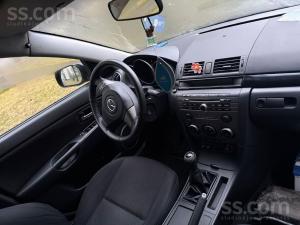 Red Mazda 3 2008 in Riga, with an engine capacity of 1.60 L and mileage of 80 thousand km for 550 €, photo 5 on AUTOMOTO.COM.LV