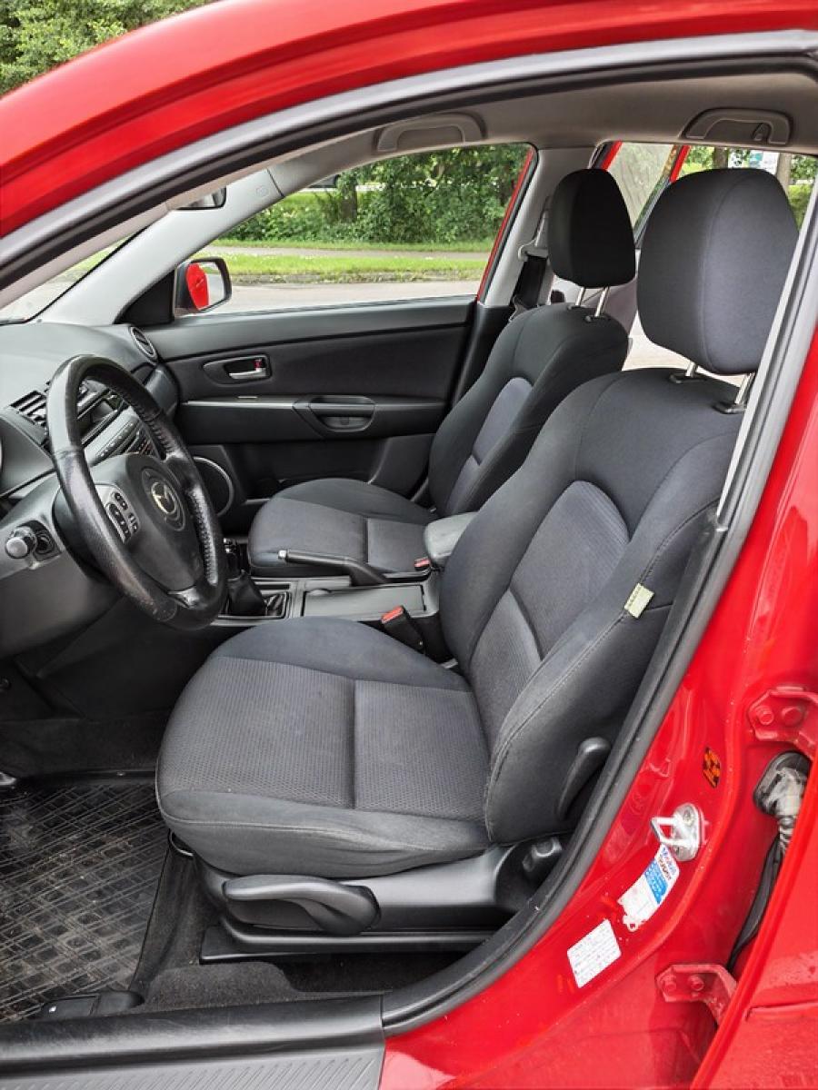 Red Mazda 3 2008 in Tallinn, with an engine capacity of 1.60 L and mileage of 208 thousand km for 1500 €, photo 21 on AUTOMOTO.COM.LV