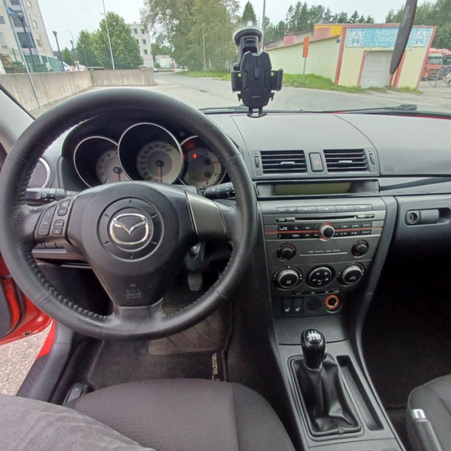 Red Mazda 3 2008 in Tallinn, with an engine capacity of 1.60 L and mileage of 211 thousand km for 2150 €, photo 6 on AUTOMOTO.COM.LV