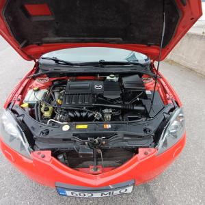 Red Mazda 3 2008 in Tallinn, with an engine capacity of 1.60 L and mileage of 211 thousand km for 2150 €, photo 8 on AUTOMOTO.COM.LV