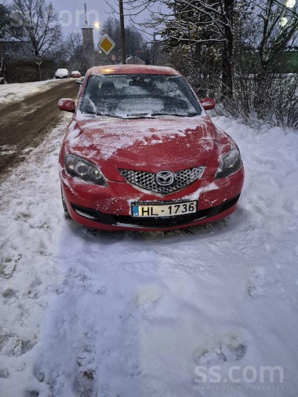 Sarkans Mazda 3 2009 Ogre, ar dzinēja tilpumu 1.40 L un nobraukumu 144 tūkst. km par 1300 €, foto 1 vietnē AUTOMOTO.COM.LV