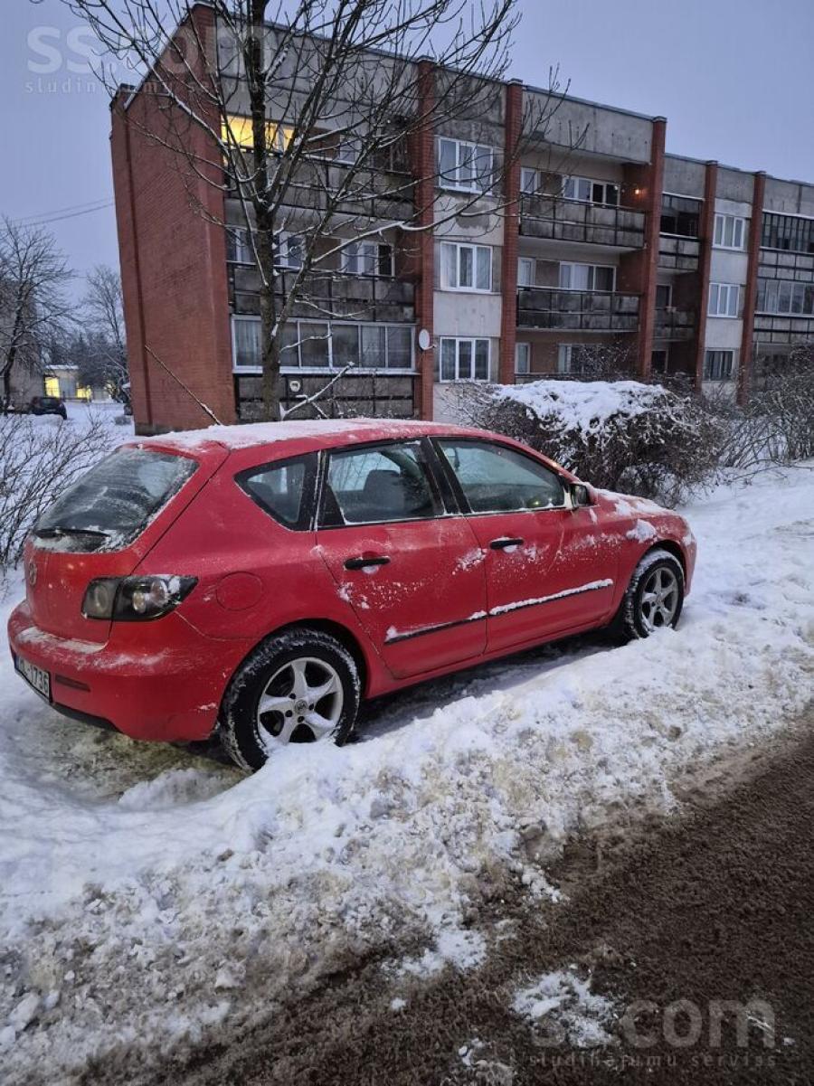 Red Mazda 3 2009 in Ogre, with an engine capacity of 1.40 L and mileage of 144 thousand km for 1300 €, photo 2 on AUTOMOTO.COM.LV