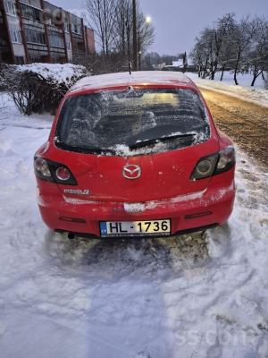 Red Mazda 3 2009 in Ogre, with an engine capacity of 1.40 L and mileage of 144 thousand km for 1300 €, photo 3 on AUTOMOTO.COM.LV