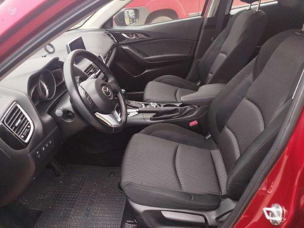 Red Mazda 3 2016 in Utena, with an engine capacity of 2.00 L and mileage of 245 thousand km for 10650 €, photo 4 on AUTOMOTO.COM.LV