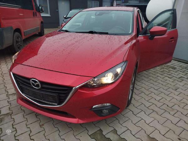 Red Mazda 3 2016 in Utena, with an engine capacity of 2.00 L and mileage of 245 thousand km for 10650 €, photo 9 on AUTOMOTO.COM.LV