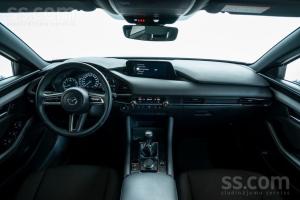 Red Mazda 3 2019 in Riga, with an engine capacity of 2.00 L and mileage of 68 thousand km for 14900 €, photo 7 on AUTOMOTO.COM.LV