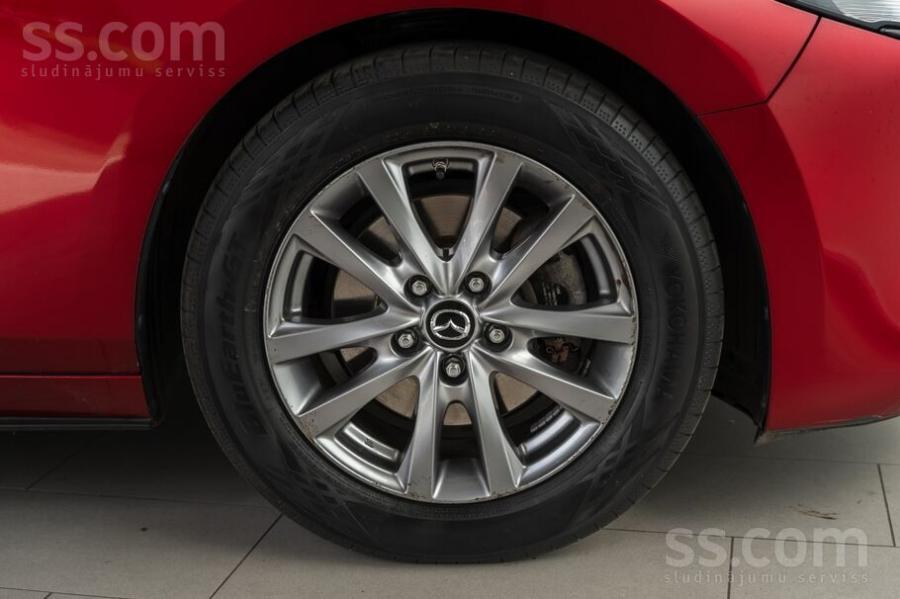 Red Mazda 3 2019 in Riga, with an engine capacity of 2.00 L and mileage of 68 thousand km for 14900 €, photo 12 on AUTOMOTO.COM.LV