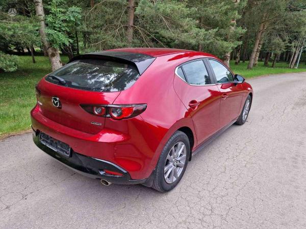 Red Mazda 3 2019 in Siauliai, with an engine capacity of 2.00 L and mileage of 56 thousand km for 14900 €, photo 7 on AUTOMOTO.COM.LV