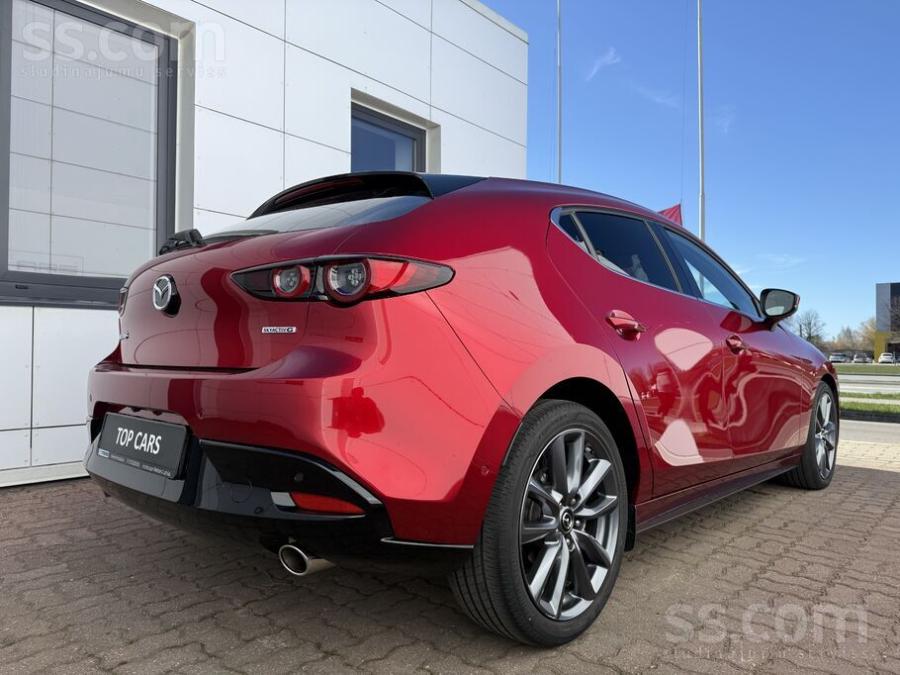 Red Mazda 3 2020 in Riga, with an engine capacity of 2.00 L and mileage of 52 thousand km for 19950 €, photo 5 on AUTOMOTO.COM.LV