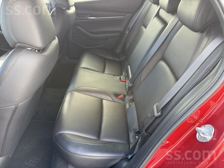 Red Mazda 3 2020 in Riga, with an engine capacity of 2.00 L and mileage of 52 thousand km for 19950 €, photo 12 on AUTOMOTO.COM.LV
