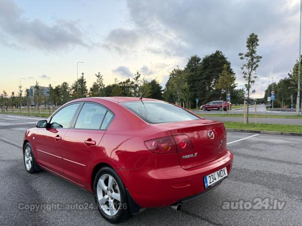 Red Mazda 3 2003 in Tallinn, with an engine capacity of 1.60 L and mileage of 115 thousand km for 899 €, photo 4 on AUTOMOTO.COM.LV