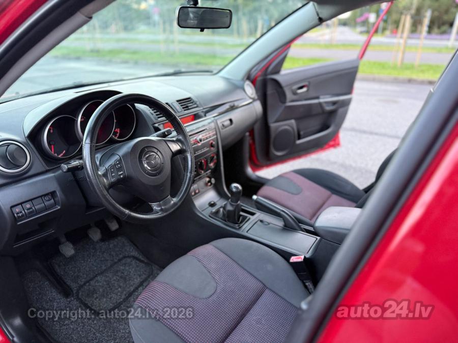Red Mazda 3 2003 in Tallinn, with an engine capacity of 1.60 L and mileage of 115 thousand km for 899 €, photo 8 on AUTOMOTO.COM.LV