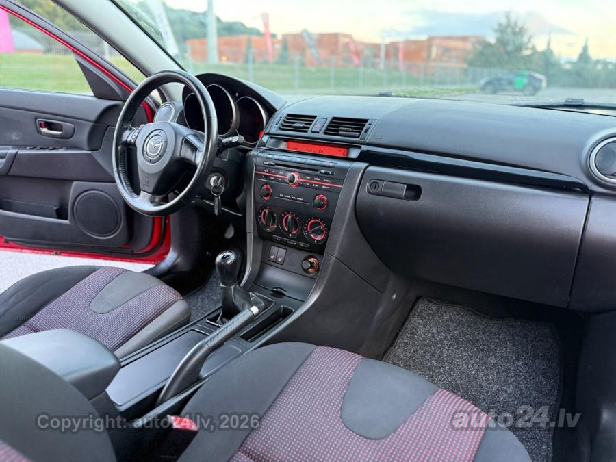 Red Mazda 3 2003 in Tallinn, with an engine capacity of 1.60 L and mileage of 115 thousand km for 899 €, photo 9 on AUTOMOTO.COM.LV
