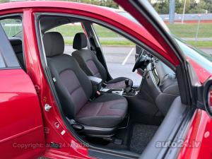 Red Mazda 3 2003 in Tallinn, with an engine capacity of 1.60 L and mileage of 115 thousand km for 899 €, photo 12 on AUTOMOTO.COM.LV