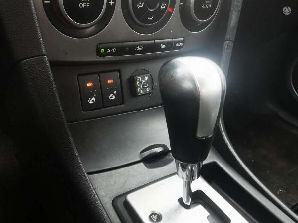 Red Mazda 3 2008 in Vilnius, with an engine capacity of 1.60 L and mileage of 235 thousand km for 1690 €, photo 2 on AUTOMOTO.COM.LV