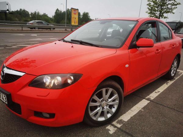 Red Mazda 3 2008 in Vilnius, with an engine capacity of 1.60 L and mileage of 235 thousand km for 1690 €, photo 4 on AUTOMOTO.COM.LV