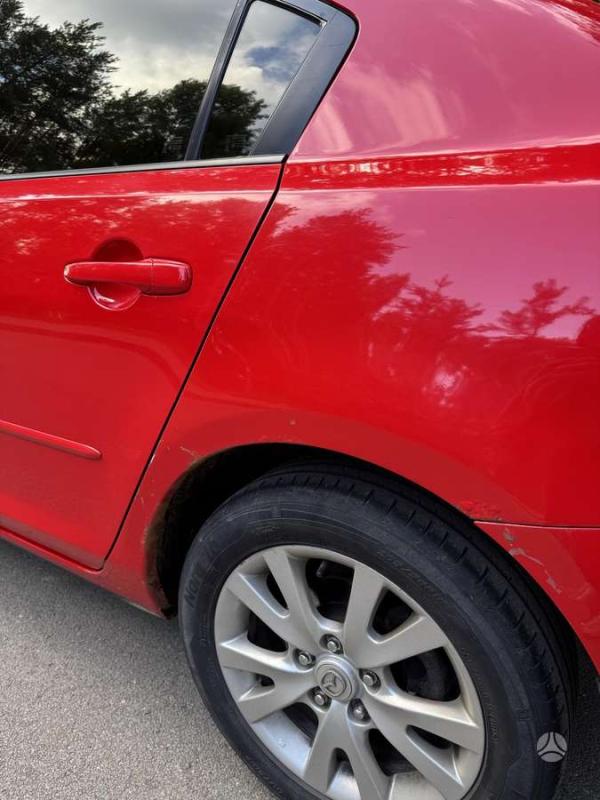 Red Mazda 3 2008 in Vilnius, with an engine capacity of 1.60 L and mileage of 185 thousand km for 1850 €, photo 6 on AUTOMOTO.COM.LV