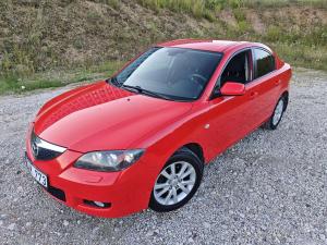 Sarkans Mazda 3 2008 Viļņa, ar dzinēja tilpumu 1.60 L un nobraukumu 184 tūkst. km par 1600 €, foto  vietnē AUTOMOTO.COM.LV
