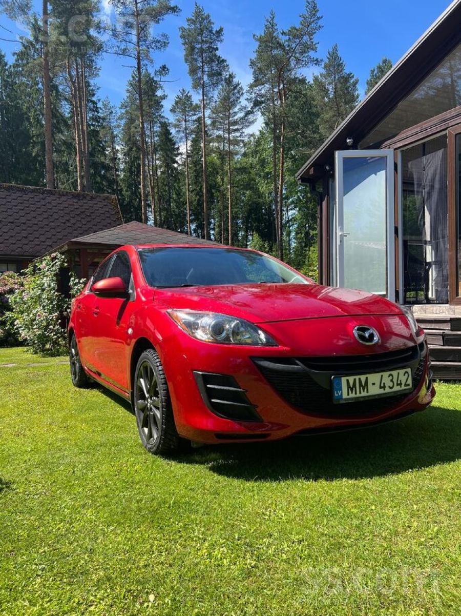 Red Mazda 3 2010 in Riga, with an engine capacity of 2.00 L and mileage of 234 thousand km for 2500 €, photo 1 on AUTOMOTO.COM.LV