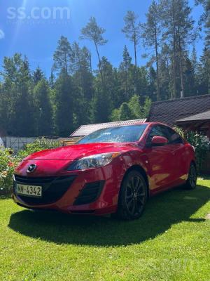 Red Mazda 3 2010 in Riga, with an engine capacity of 2.00 L and mileage of 234 thousand km for 2500 €, photo 3 on AUTOMOTO.COM.LV