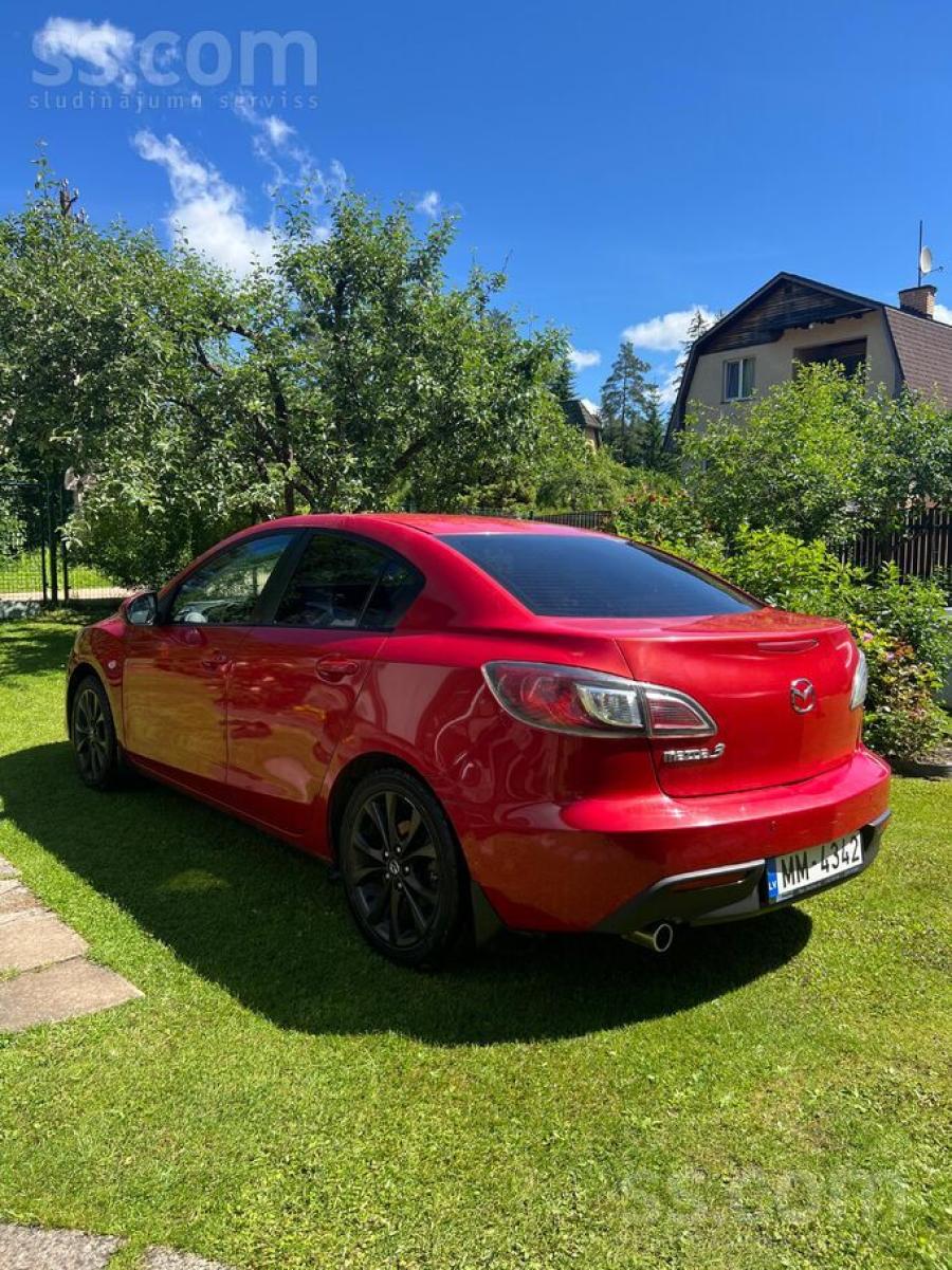 Red Mazda 3 2010 in Riga, with an engine capacity of 2.00 L and mileage of 234 thousand km for 2500 €, photo 6 on AUTOMOTO.COM.LV