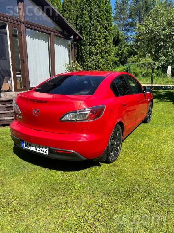 Red Mazda 3 2010 in Riga, with an engine capacity of 2.00 L and mileage of 234 thousand km for 2500 €, photo 6 on AUTOMOTO.COM.LV