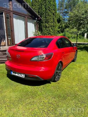 Red Mazda 3 2010 in Riga, with an engine capacity of 2.00 L and mileage of 234 thousand km for 2500 €, photo 7 on AUTOMOTO.COM.LV
