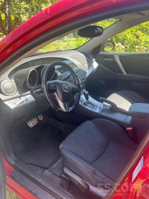 Red Mazda 3 2010 in Riga, with an engine capacity of 2.00 L and mileage of 234 thousand km for 2500 €, photo 9 on AUTOMOTO.COM.LV