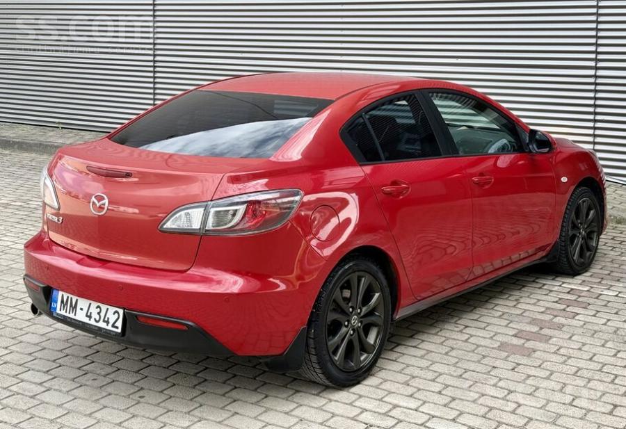 Red Mazda 3 2010 in Riga, with an engine capacity of 2.00 L and mileage of 234 thousand km for 1990 €, photo 4 on AUTOMOTO.COM.LV
