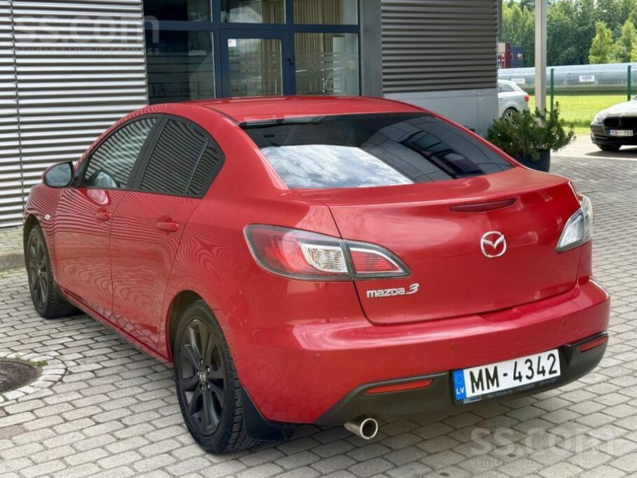 Red Mazda 3 2010 in Riga, with an engine capacity of 2.00 L and mileage of 234 thousand km for 1990 €, photo 5 on AUTOMOTO.COM.LV