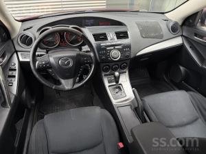 Red Mazda 3 2010 in Riga, with an engine capacity of 2.00 L and mileage of 234 thousand km for 1990 €, photo 6 on AUTOMOTO.COM.LV
